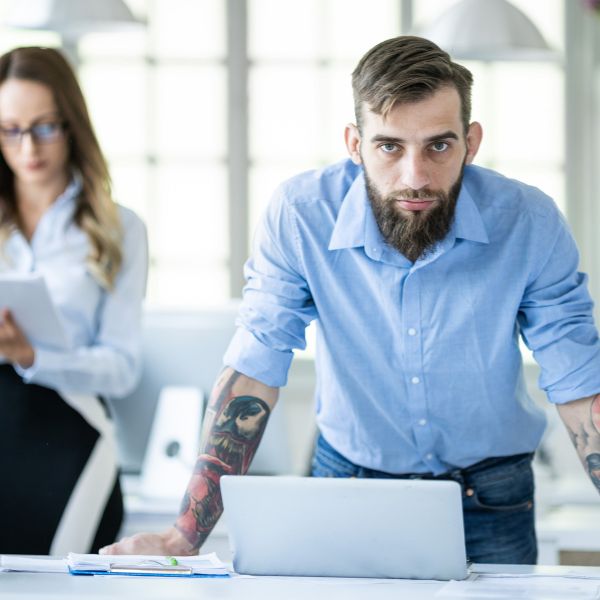 A guide to tattoos in the workplace for employers and employees ...